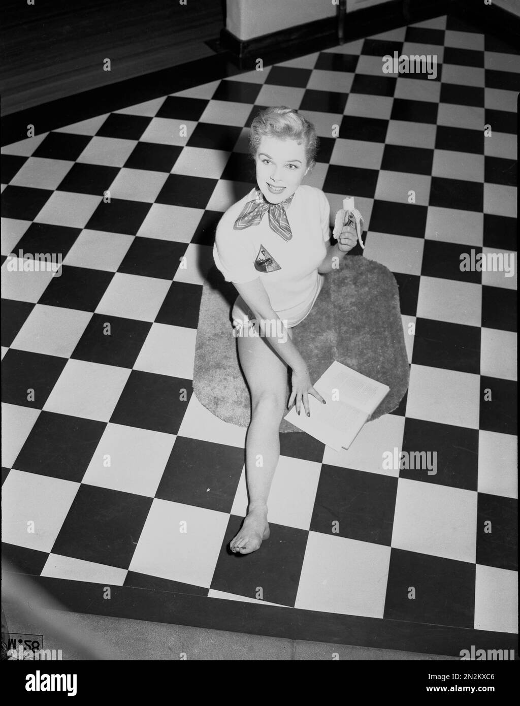 FILE - This June 5, 1952 file photo shows Sally Forrest posing in her home in Hollywood Calif ...